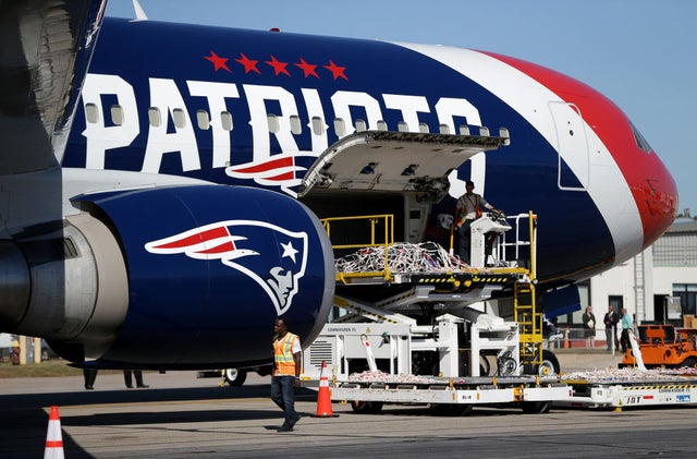 New England Patriots jet transports 1 million masks from China - The ...