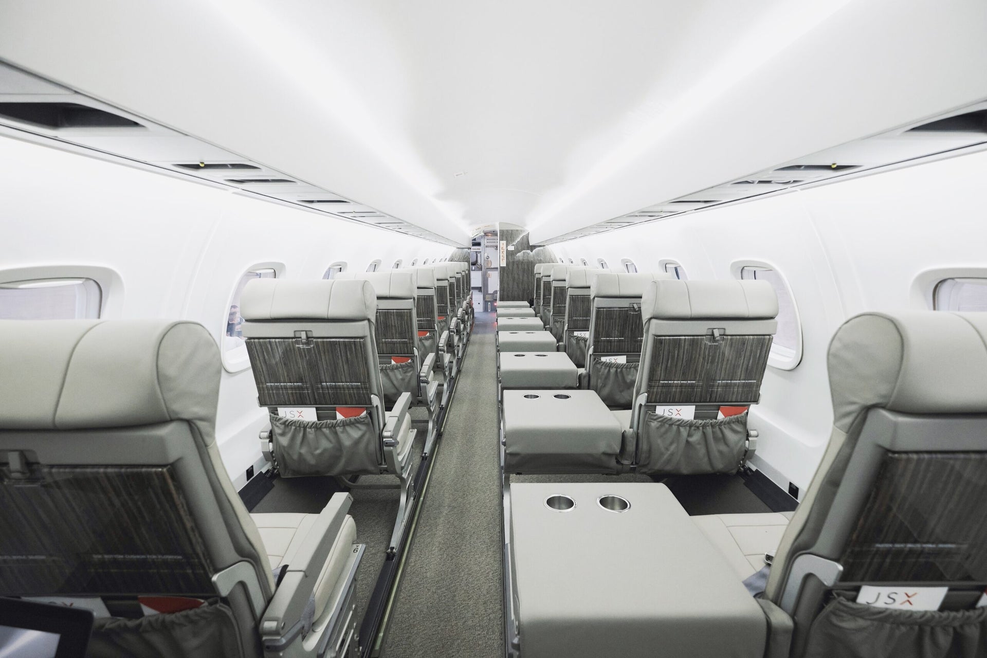 JSX debuts a 30-seat regional jet in a luxurious 1-1 configuration ...