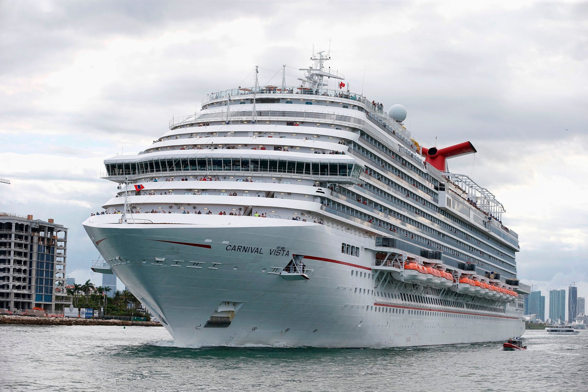 Cruise giant Carnival grapples with a significant COVID-19 outbreak on ...