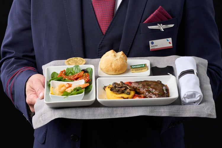 Hot food is officially coming back on American Airlines this month ...