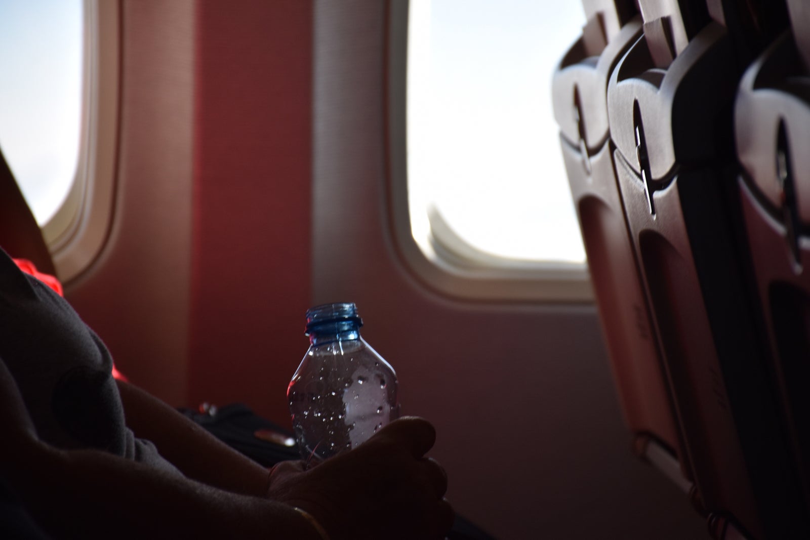 Tips for combating aches and pains on long flights - The Points Guy