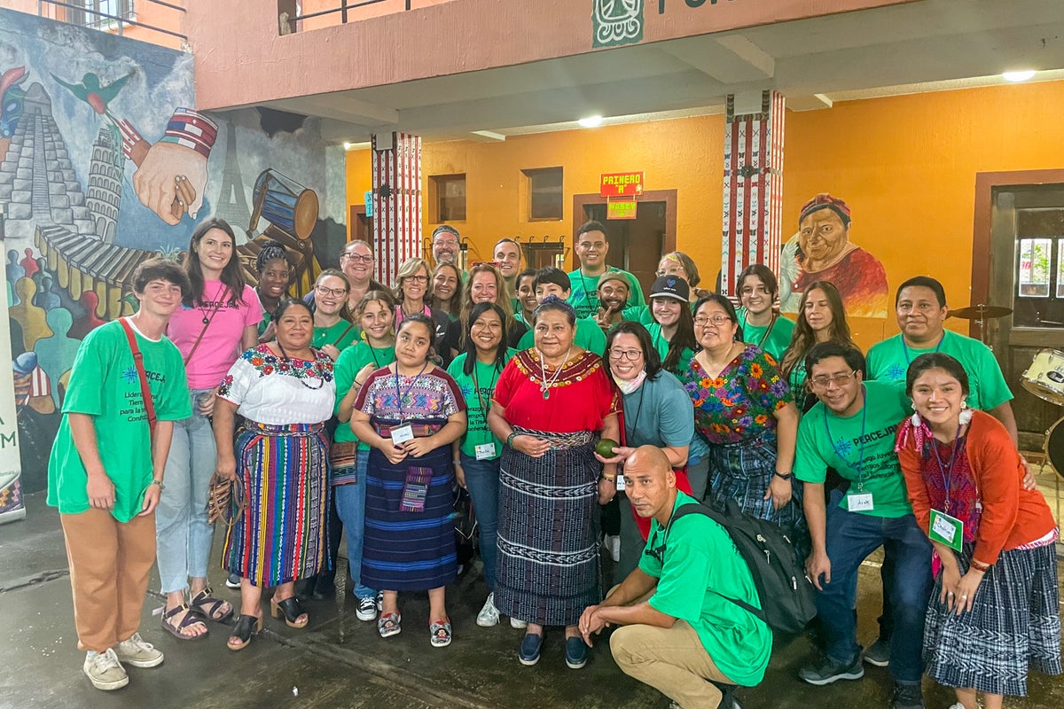 TPG at the PeaceJam Guatemala conference in 2022 - The Points Guy