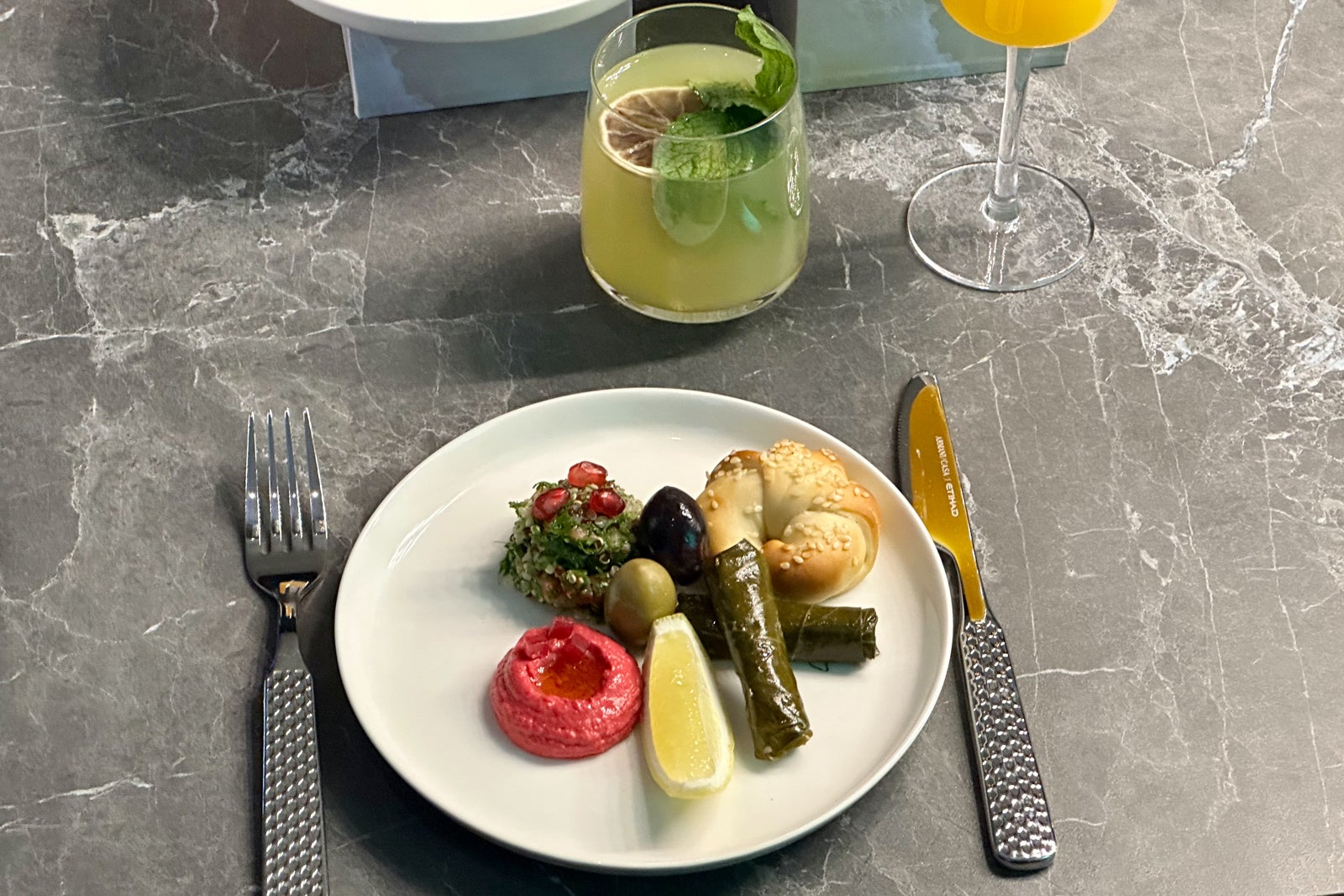 Etihad unveils overhauled premium experience in partnership with Armani ...