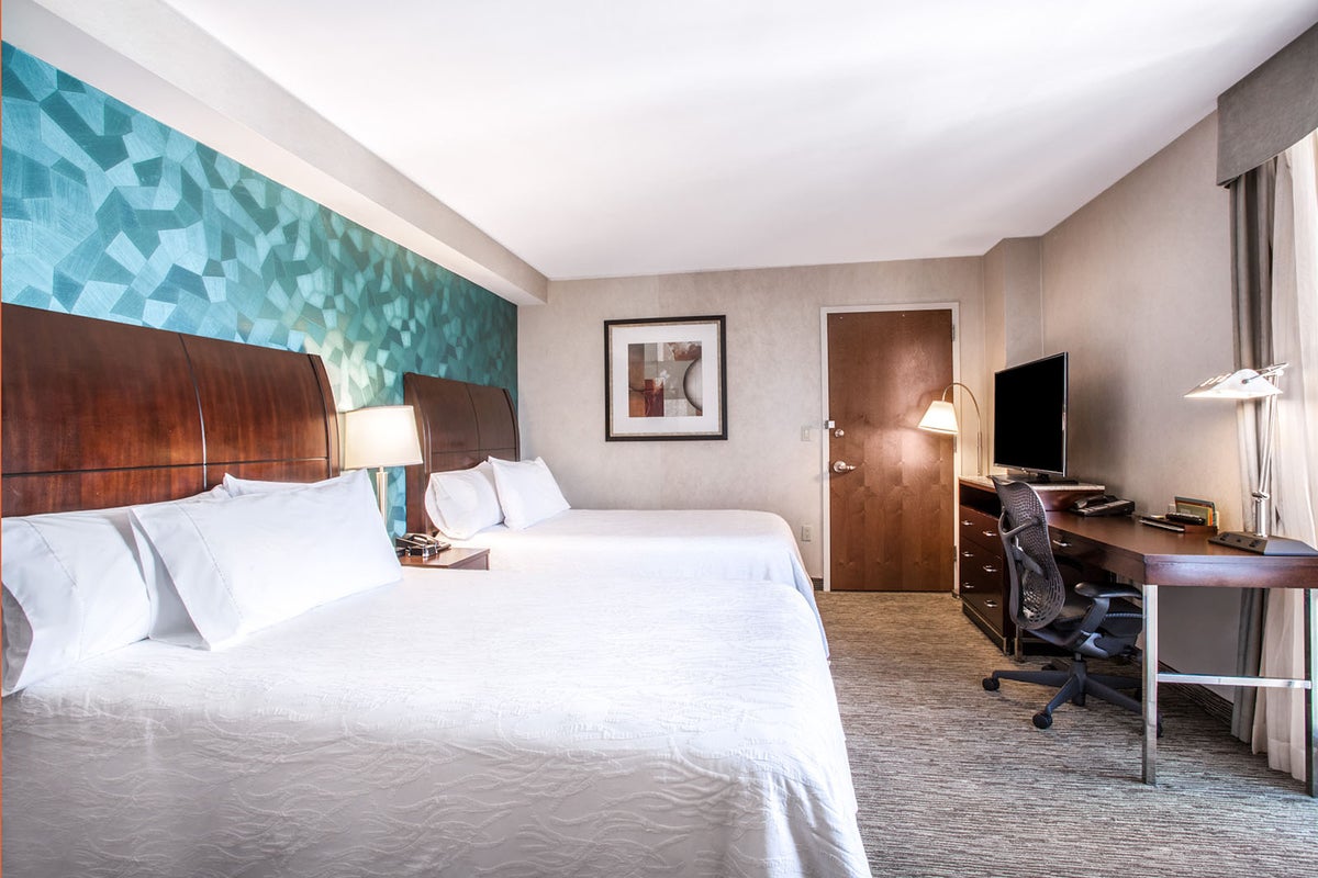 Hilton Diamond Status: Benefits and How to Get It - Travel Tales & Trails