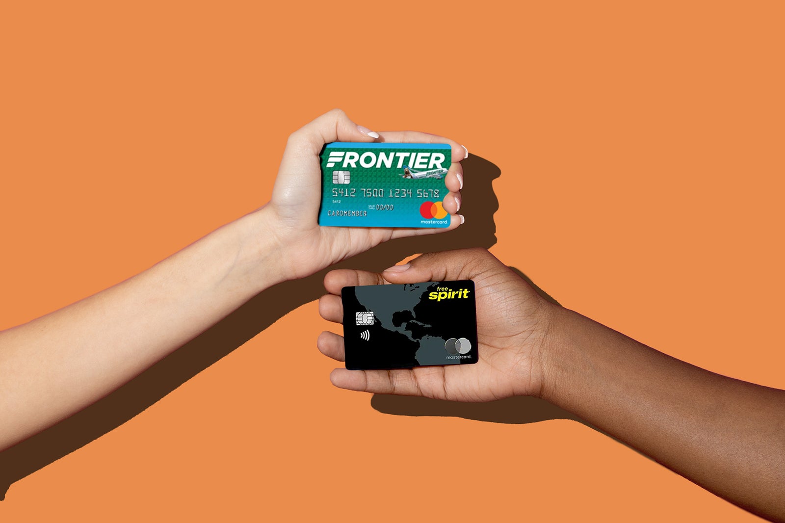 Frontier Airlines World Mastercard vs. Free Spirit Travel More World ...