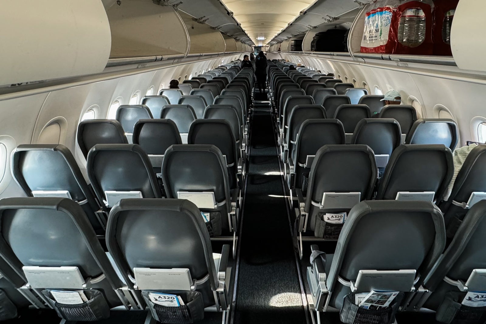 Frontier Airlines announces first-class seats, companion pass for elite members - The Points Guy